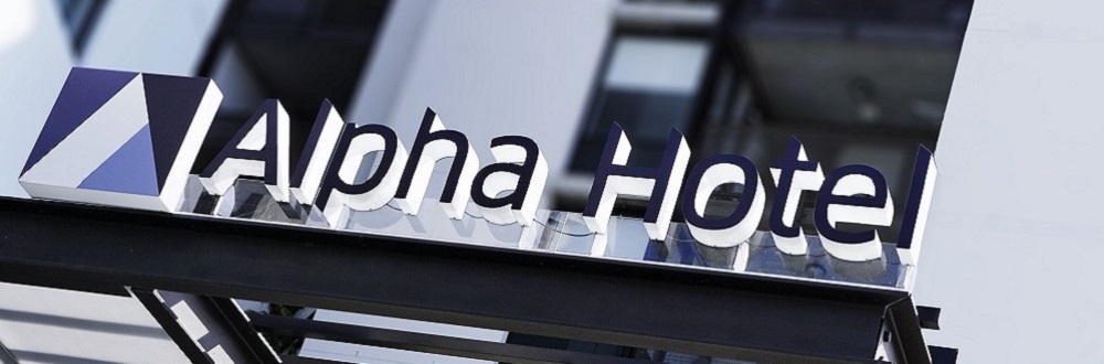 Exterior Alpha Sign 1000x330 - Alpha Hotels
